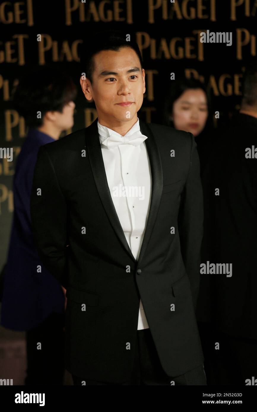 Taiwan actor Eddie Peng poses on the red carpet of the 33rd Hong Kong ...