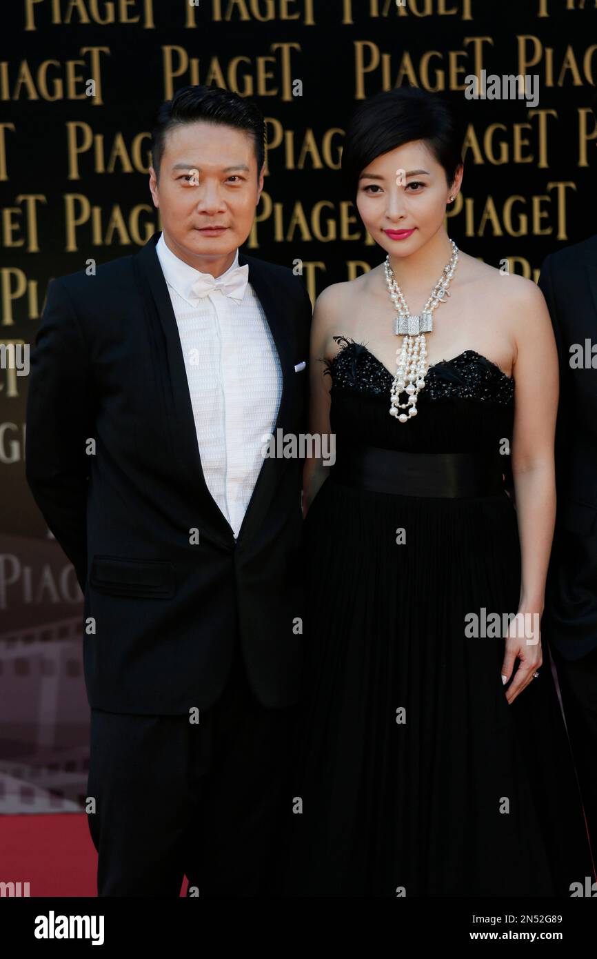 Hong Kong martial art director Chin Kar-lok poses with his wife Angela ...