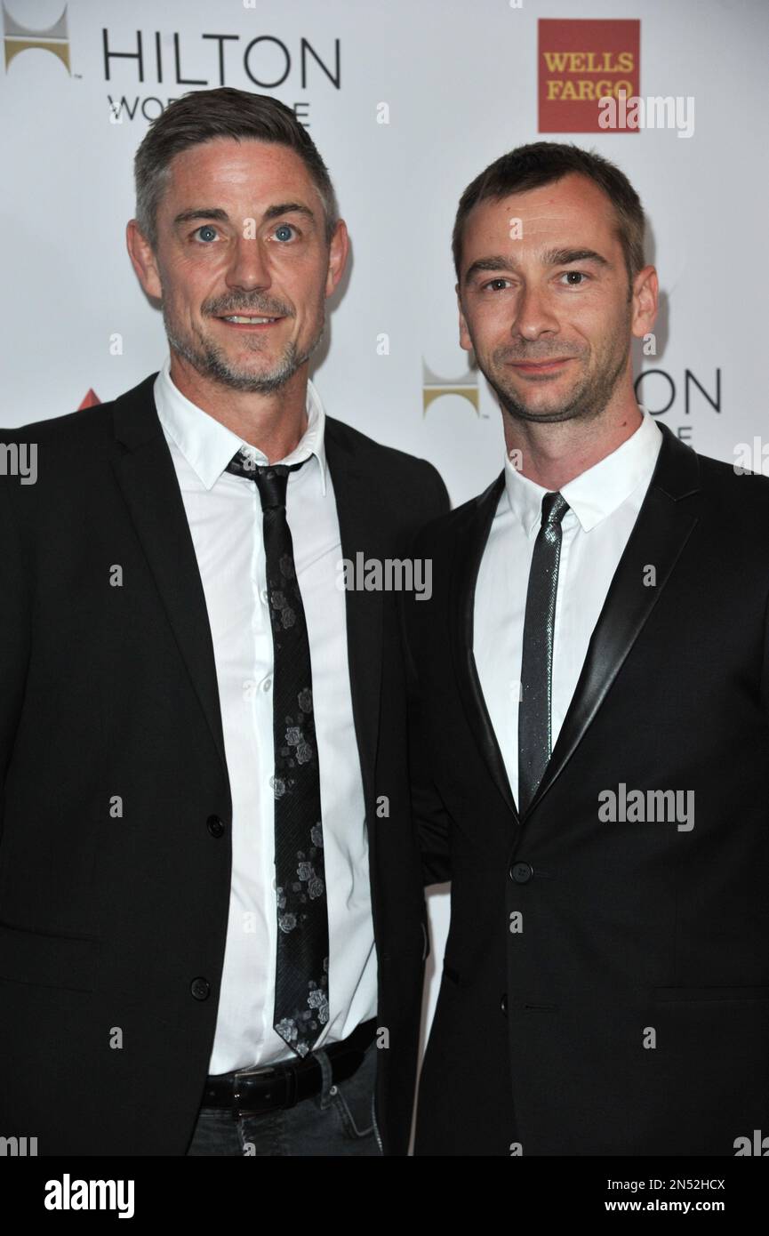 Cameron Laux, left, and Charlie Condou arrive at the 25th Annual GLAAD ...