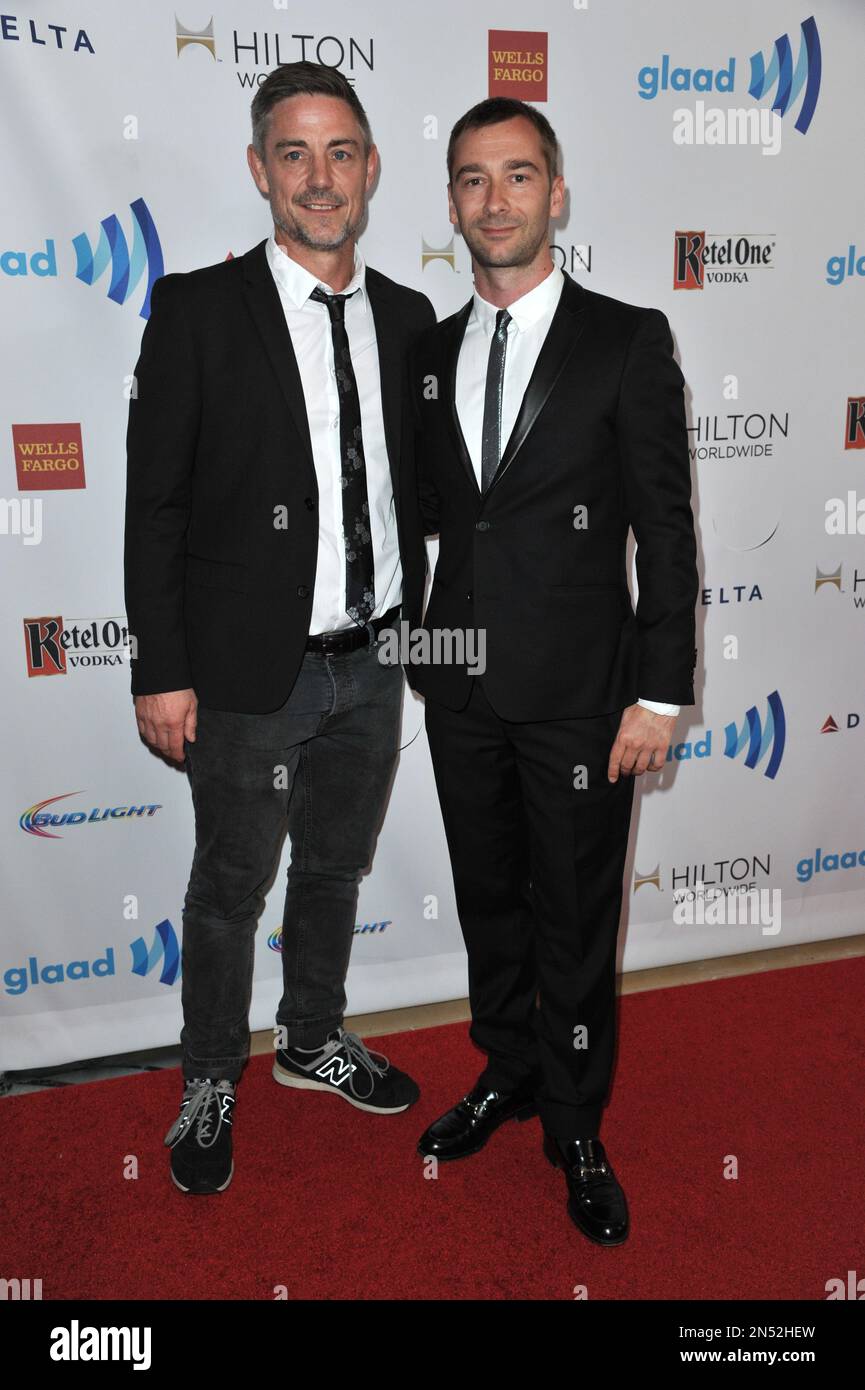 Cameron Laux, left, and Charlie Condou arrive at the 25th Annual GLAAD ...