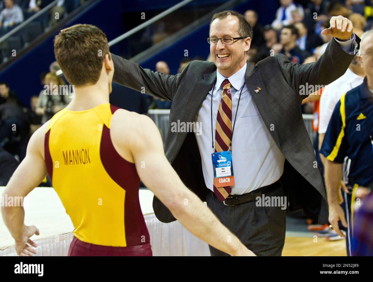 Minnesota’s Ellis Mannon celebrates with coach Mike Burns after his ...