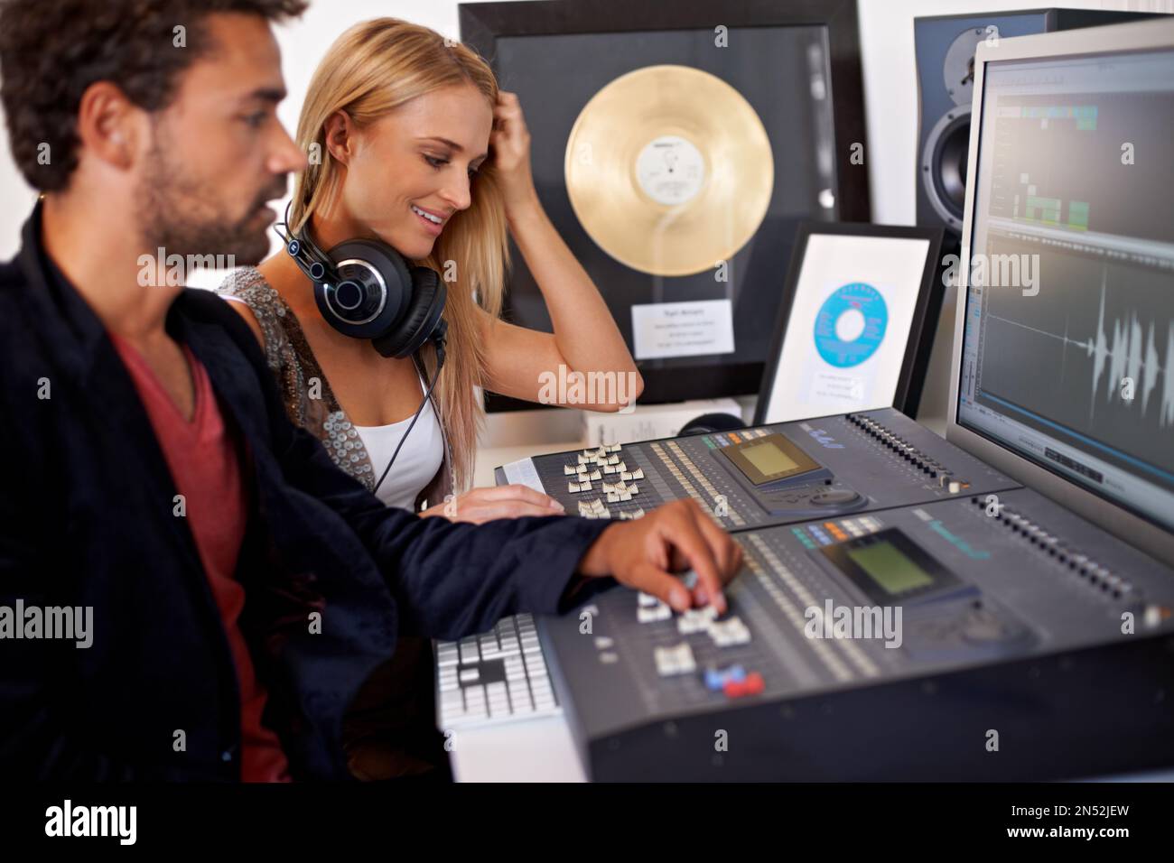 High resolution recording. A young audio engineer working on a mixing ...