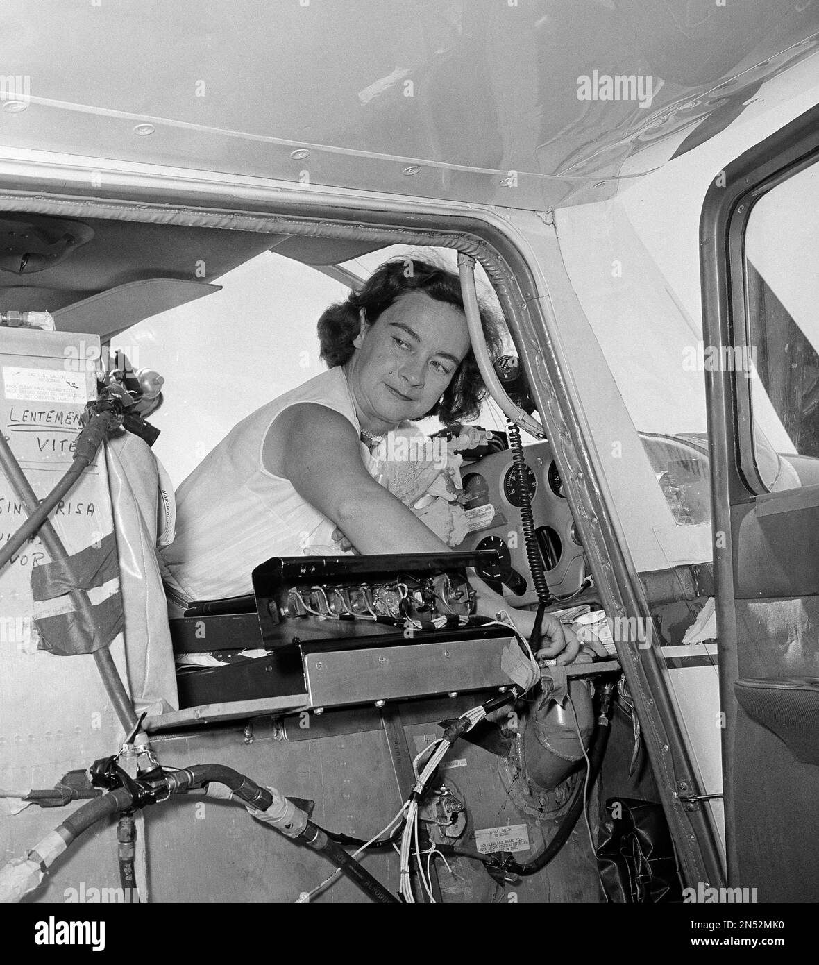 FILE - This photo made April 16, 1964, shows Jerrie Mock checking her ...