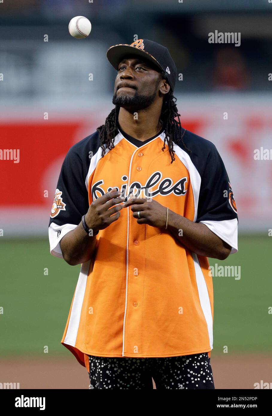 Baltimore Ravens cornerback Lardarius Webb prepares to throw out the ...
