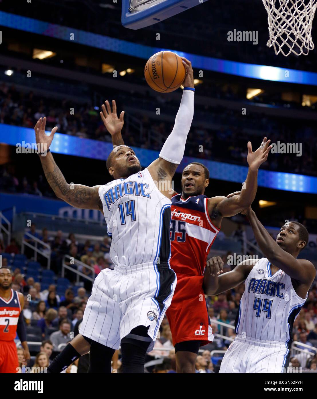 Orlando Magic forward Andrew Nicholson (44), of Canada, assists Jameer ...