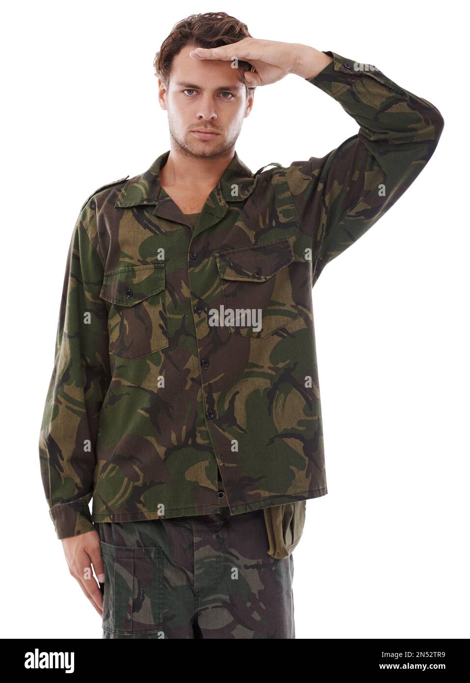 Showing respect to his superiors. Portrait of a serious young militant ...