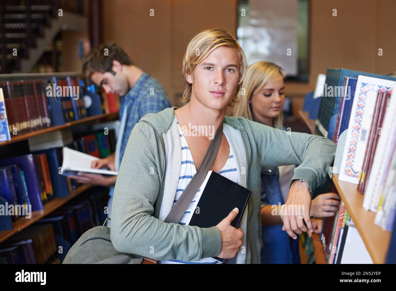 Working together to prepare for finals. A group of young people studying together for the ...
