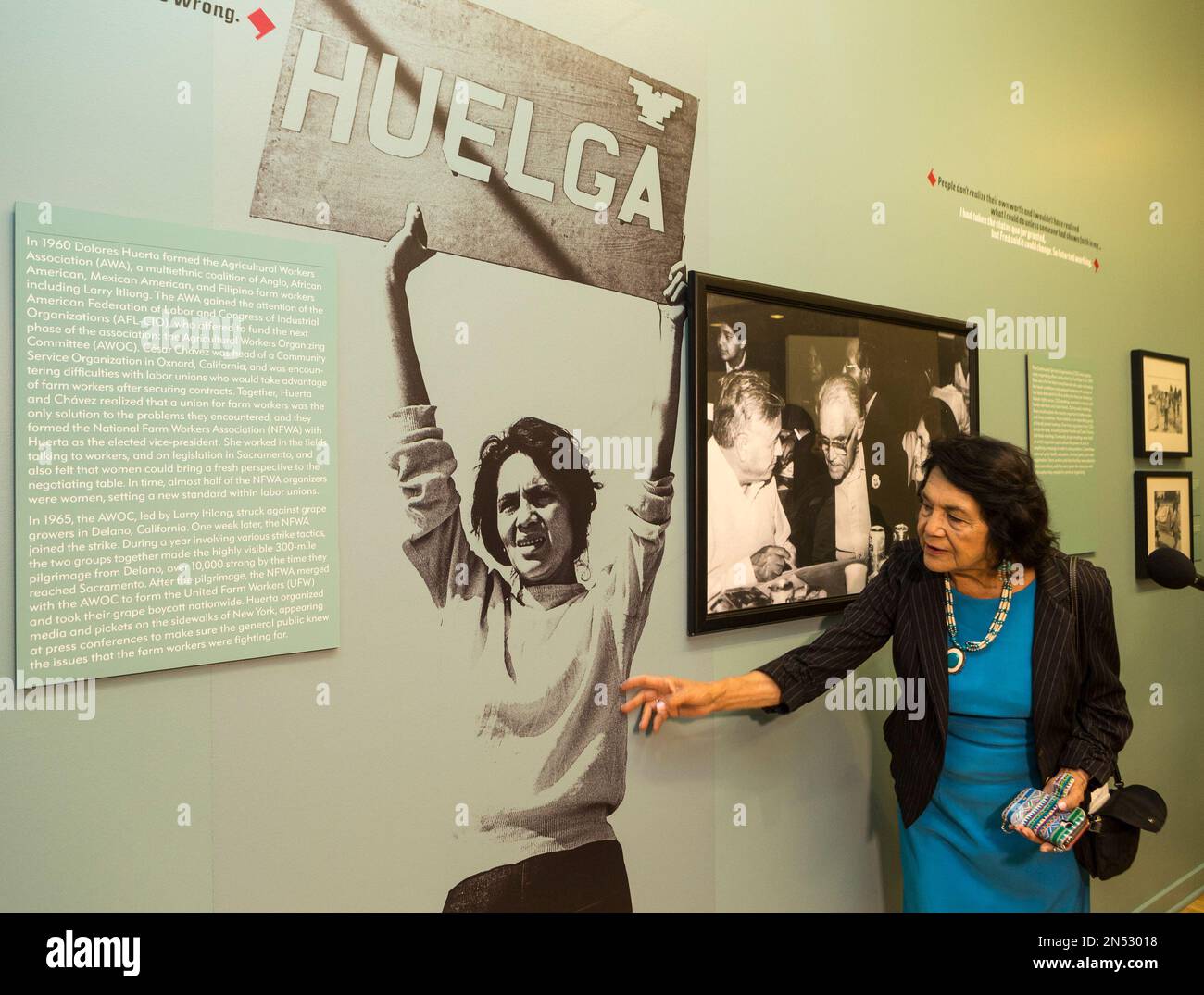 Dolores Huerta, co-founder of United Farms Workers looks at an iconic ...