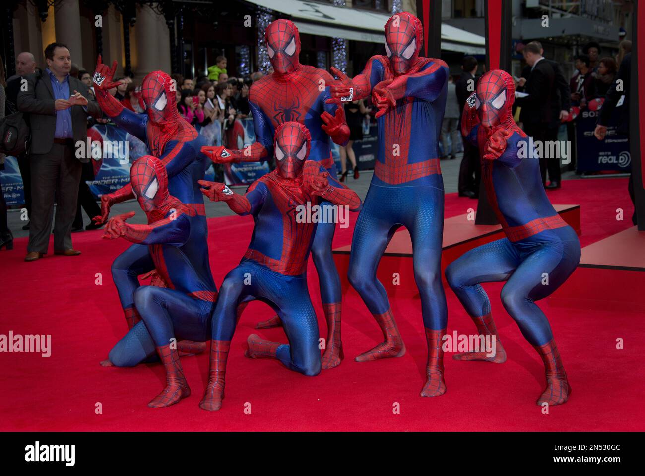 Costumed spidermen arrive for the World premiere of The Amazing ...