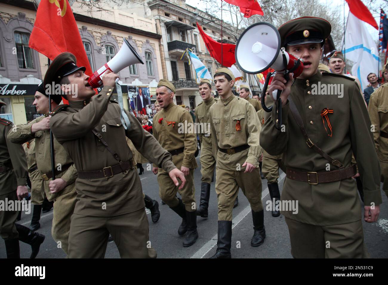 Pro-Russian demonstrators wearing World War II Soviet army uniforms ...