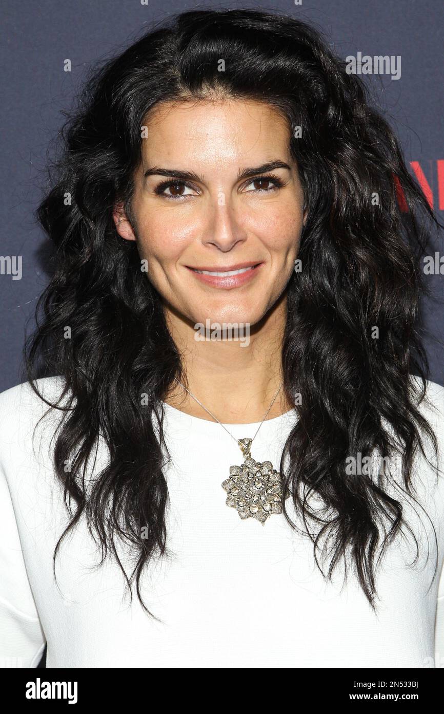 Angie Harmon attends the Zooey Deschanel for Tommy Hilfiger Collection ...