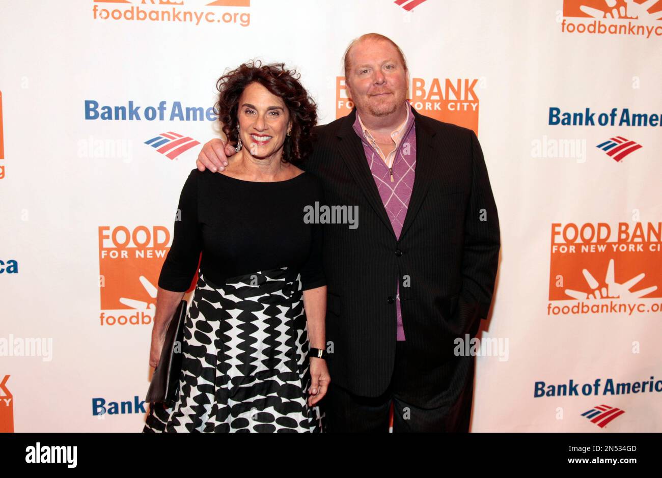 Restauranteur Mario Batali, right, with his wife Susi Cahn, left ...