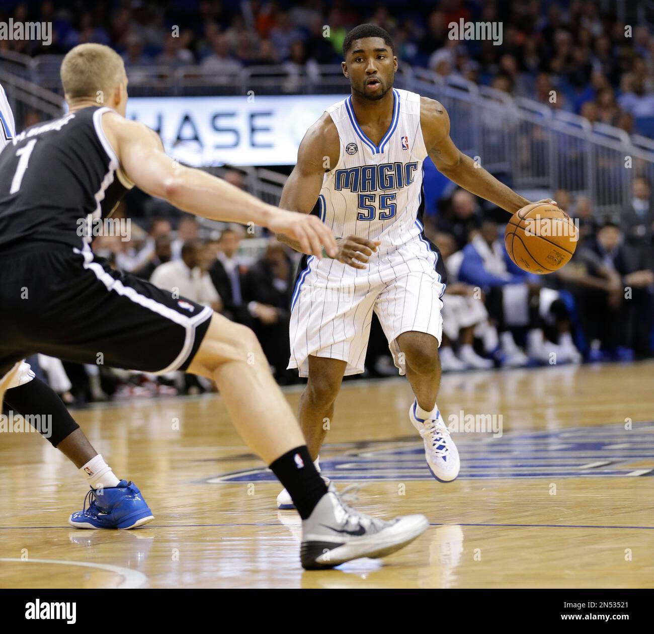 Orlando Magic's E'Twaun Moore (55) looks to get past Brooklyn Nets ...
