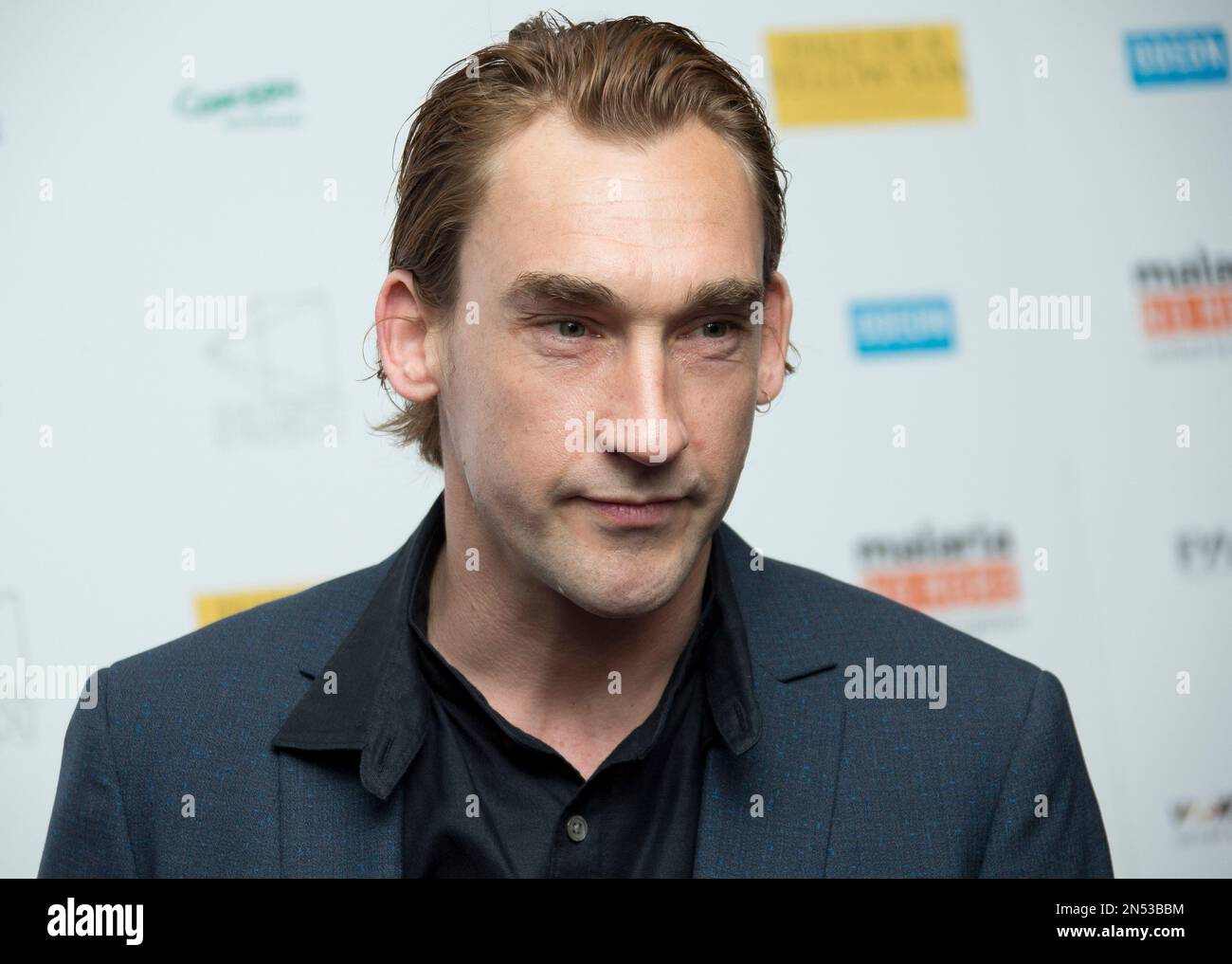 Joseph Mawle arrives on the red carpet for the UK film premiere of Half ...