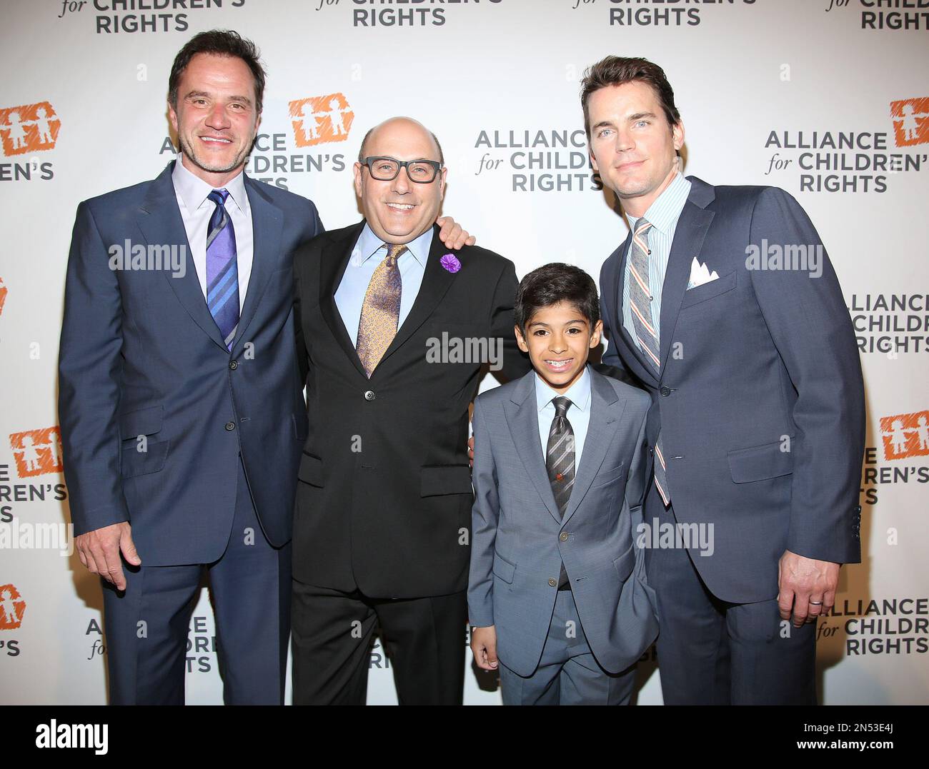 From left, Tim DeKay, Willie Garson, Nathen Garson, and Matt Bomer ...