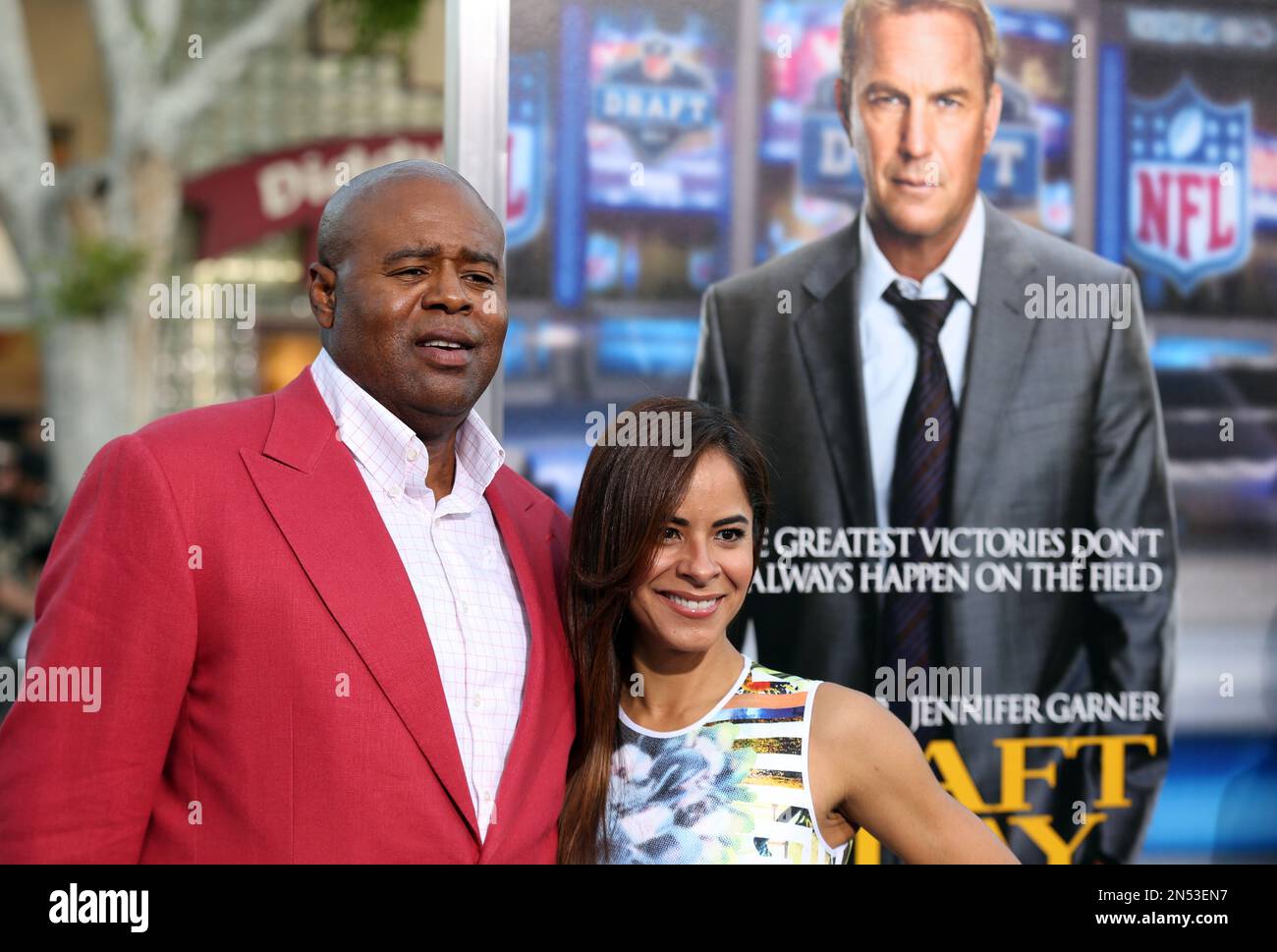Chi McBride, left, arrives at the premiere of "Draft Day" on Monday, April 7, 2014 in Los ...