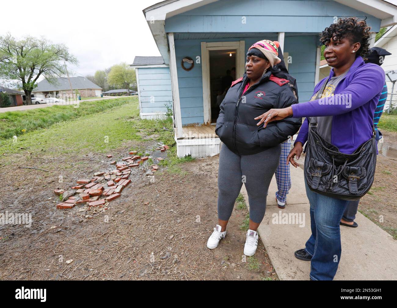 Debra Taylor, right, and Jennifer Taylor, stand outside the ...