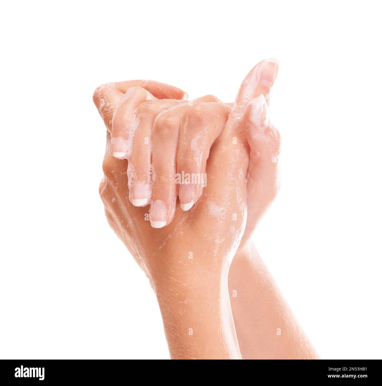 Pampering her hands. a woman lathering her hands Stock Photo - Alamy