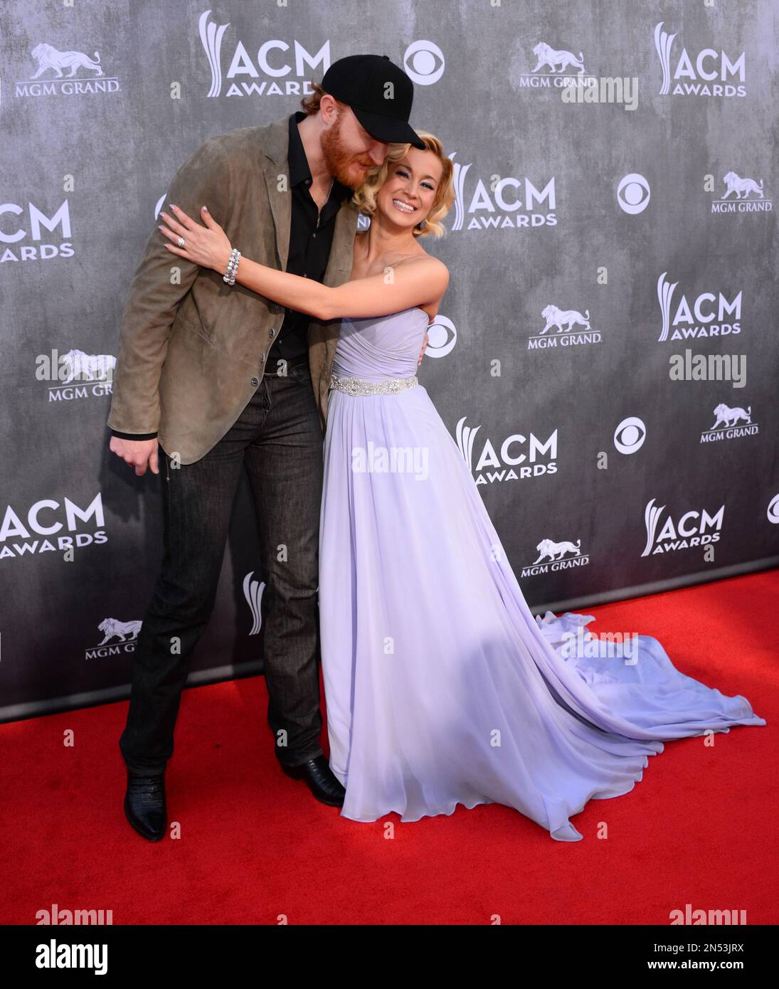 Eric Paslay, left, and Kellie Pickler arrive at the 49th annual Academy ...