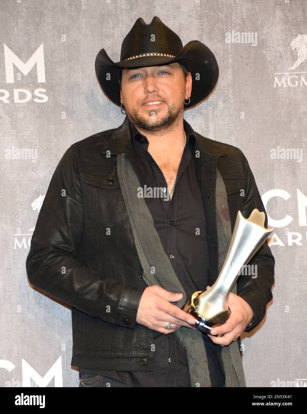 Jason Aldean Poses In The Press Room With The Award For Male Vocalist