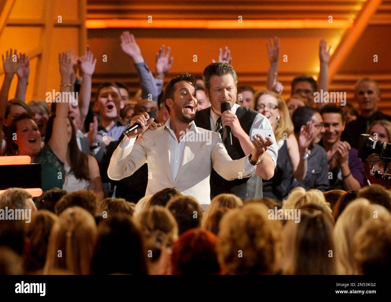 Luke Bryan, left, and Blake Shelton take a selfie in the audience at ...