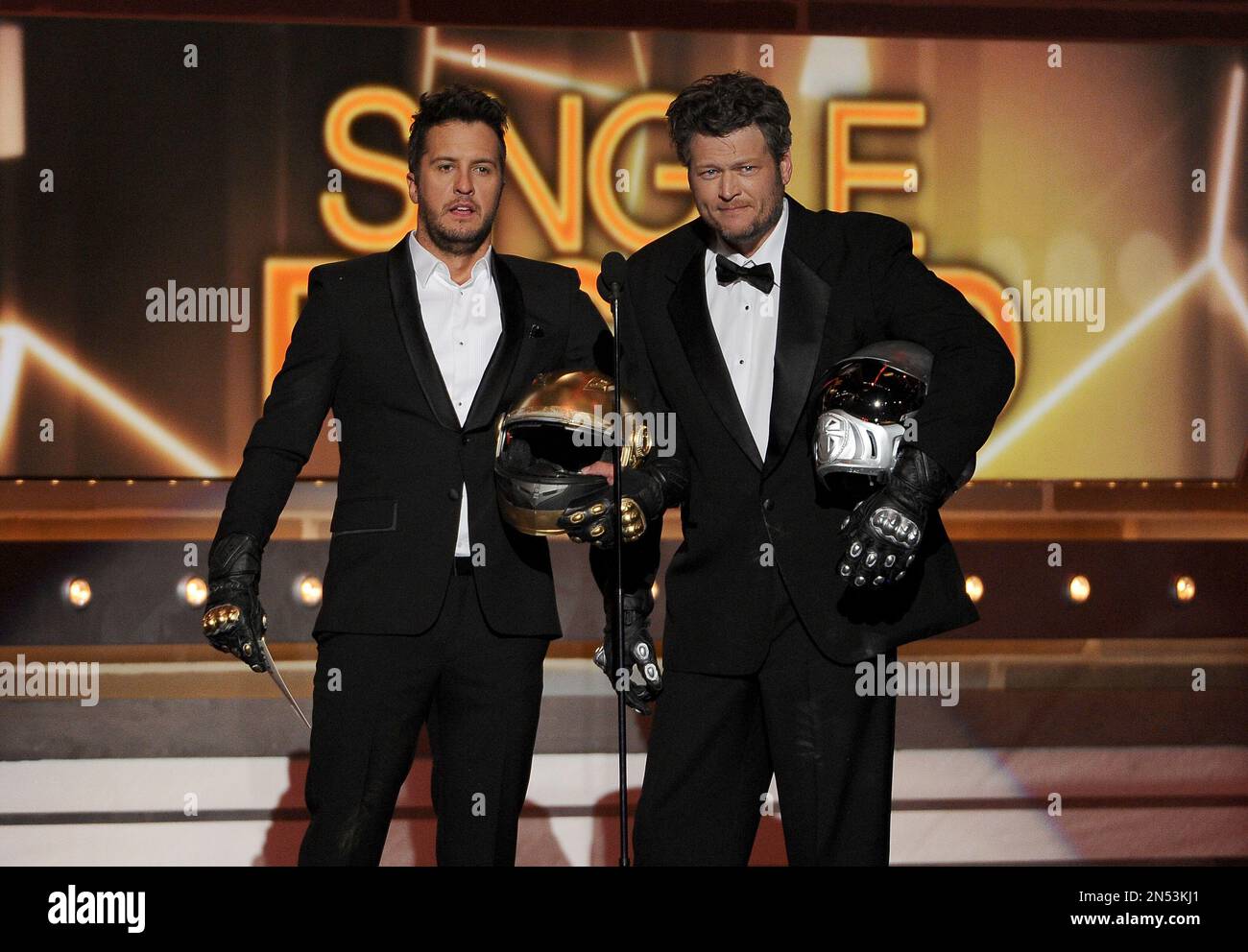 Hosts Luke Bryan, left, and Blake Shelton speak on stage at the 49th ...