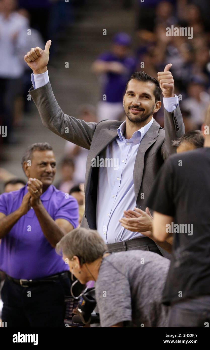 Retired Sacramento Kings forward Peja Stojakovic waves to the crowd ...