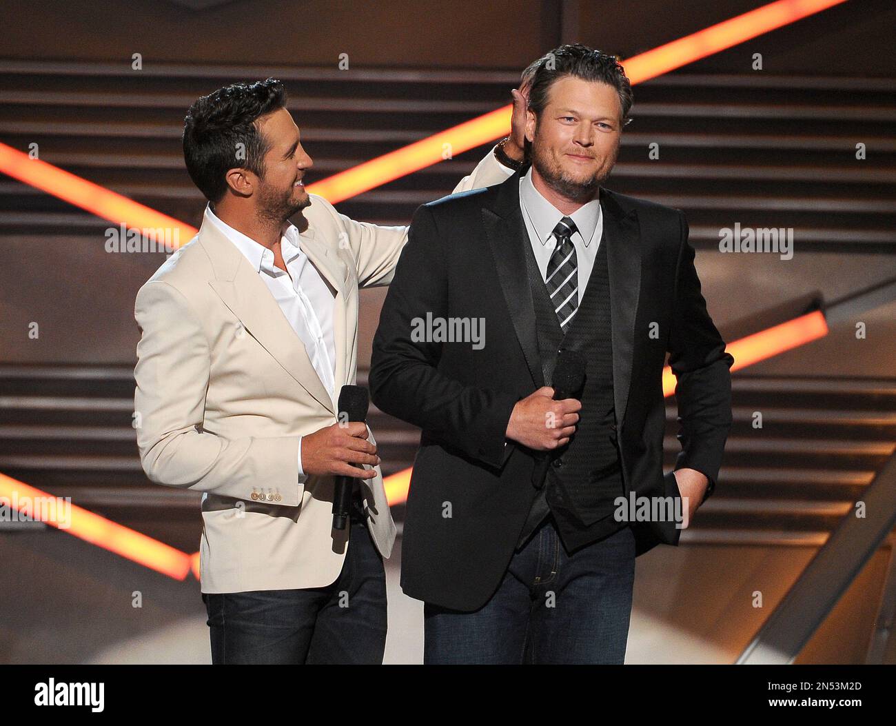 Hosts Luke Bryan, left, and Blake Shelton speak on stage at the 49th ...