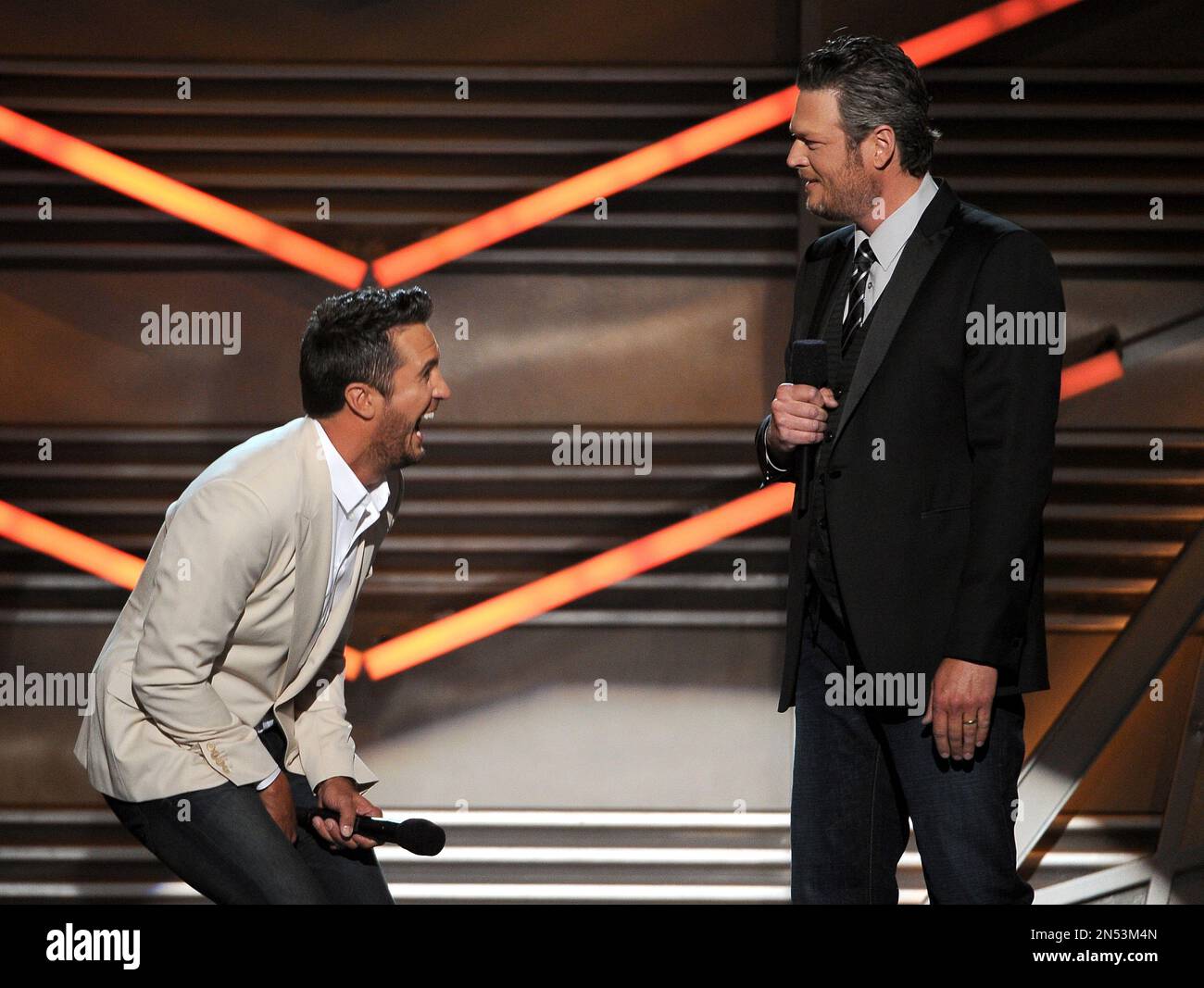 Hosts Luke Bryan, left, and Blake Shelton speak on stage at the 49th ...