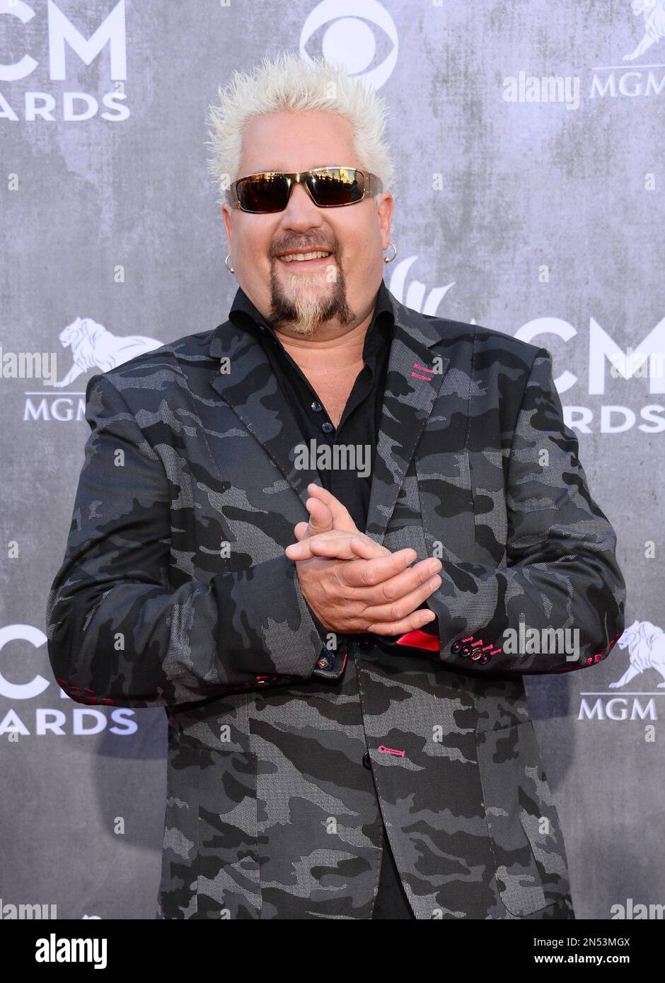 Guy Fieri arrives at the 49th annual Academy of Country Music Awards at ...