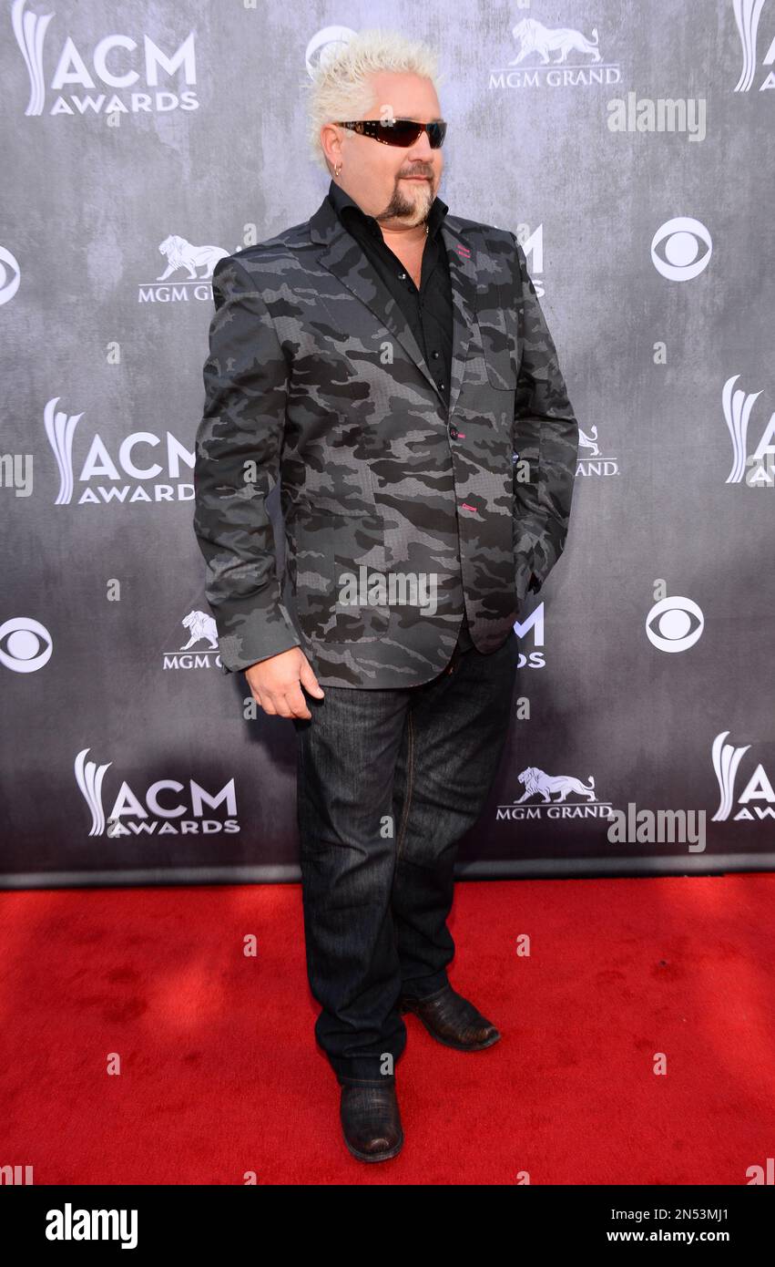 Guy Fieri arrives at the 49th annual Academy of Country Music Awards at ...