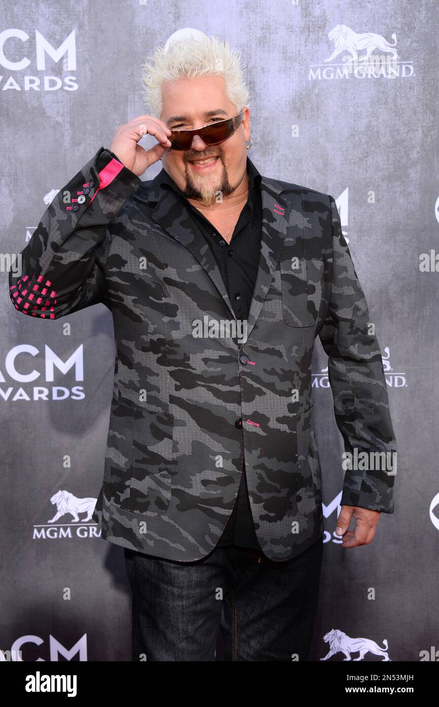 Guy Fieri arrives at the 49th annual Academy of Country Music Awards at ...