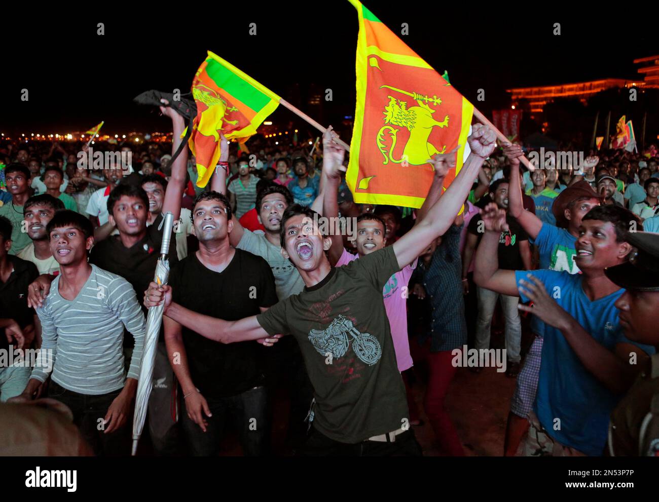 Sri Lanka cricket fans carry their national flag in Colombo, Sri Lanka ...