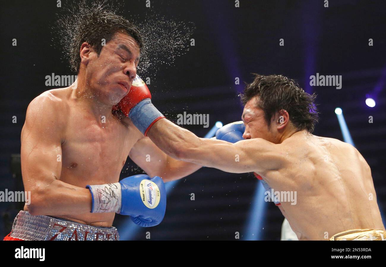 Japanese champion Akira Yaegashi, right, sends a left to Mexican ...