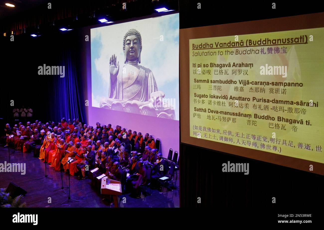 Buddhist monks offer prayers during a mass prayer for the missing ...