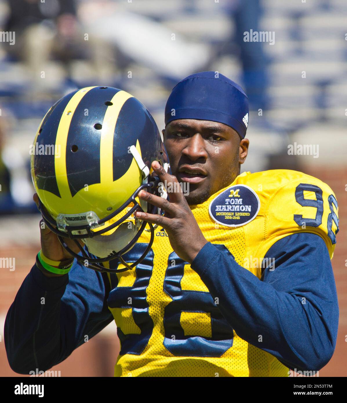 Michigan quarterback Devin Gardner (98) holds his helmet, during the ...