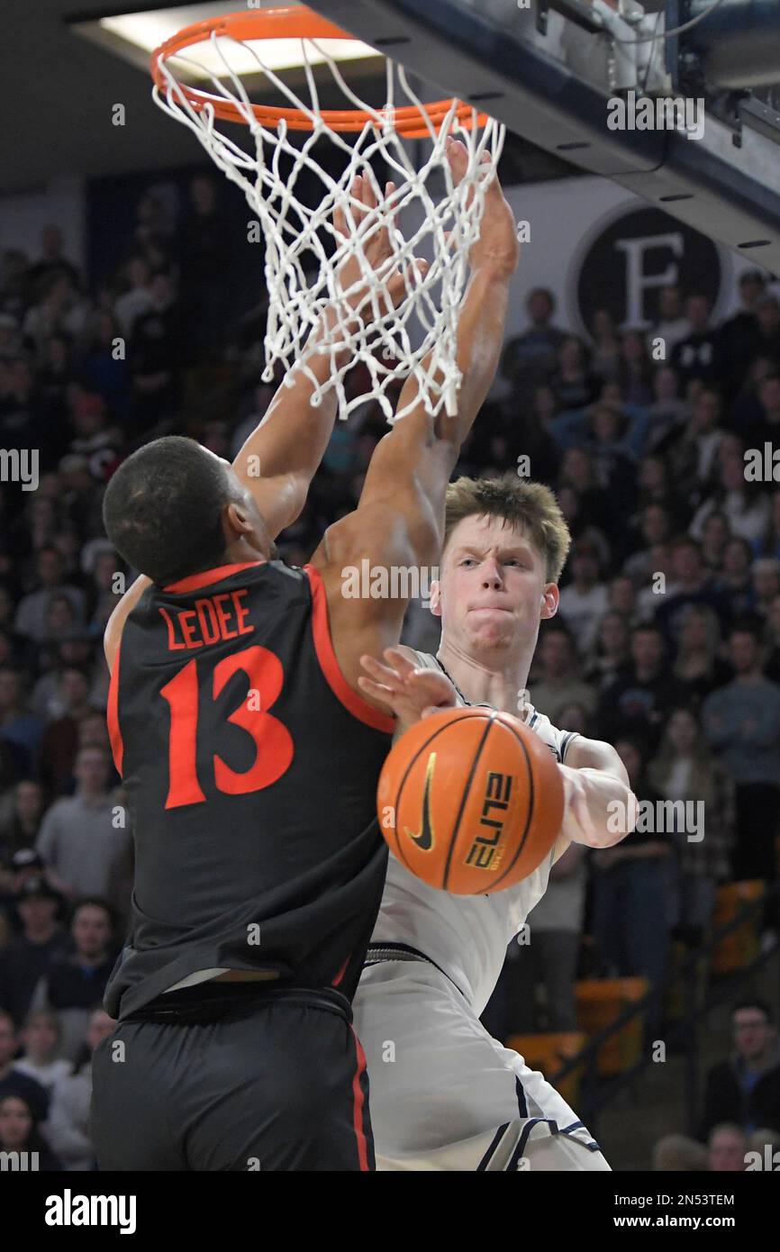 Utah State guard Max Shulga, right, passes the ball past San Diego ...