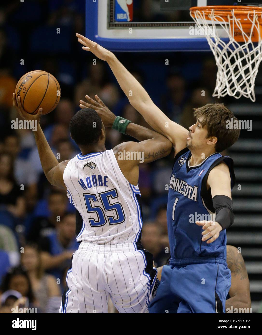 Minnesota Timberwolves' Alexey Shved, right, tries to block a shot by ...