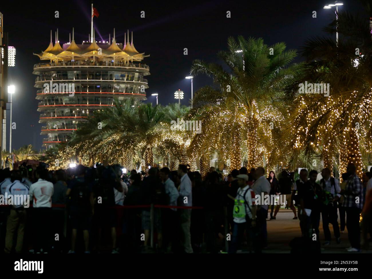 Reporters stand in the mixed zone of the paddock during the qualifying ...