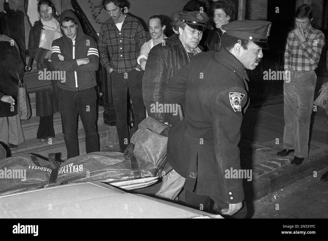 FILE - In this Feb. 2, 1979 file photo, New York City police carry the ...
