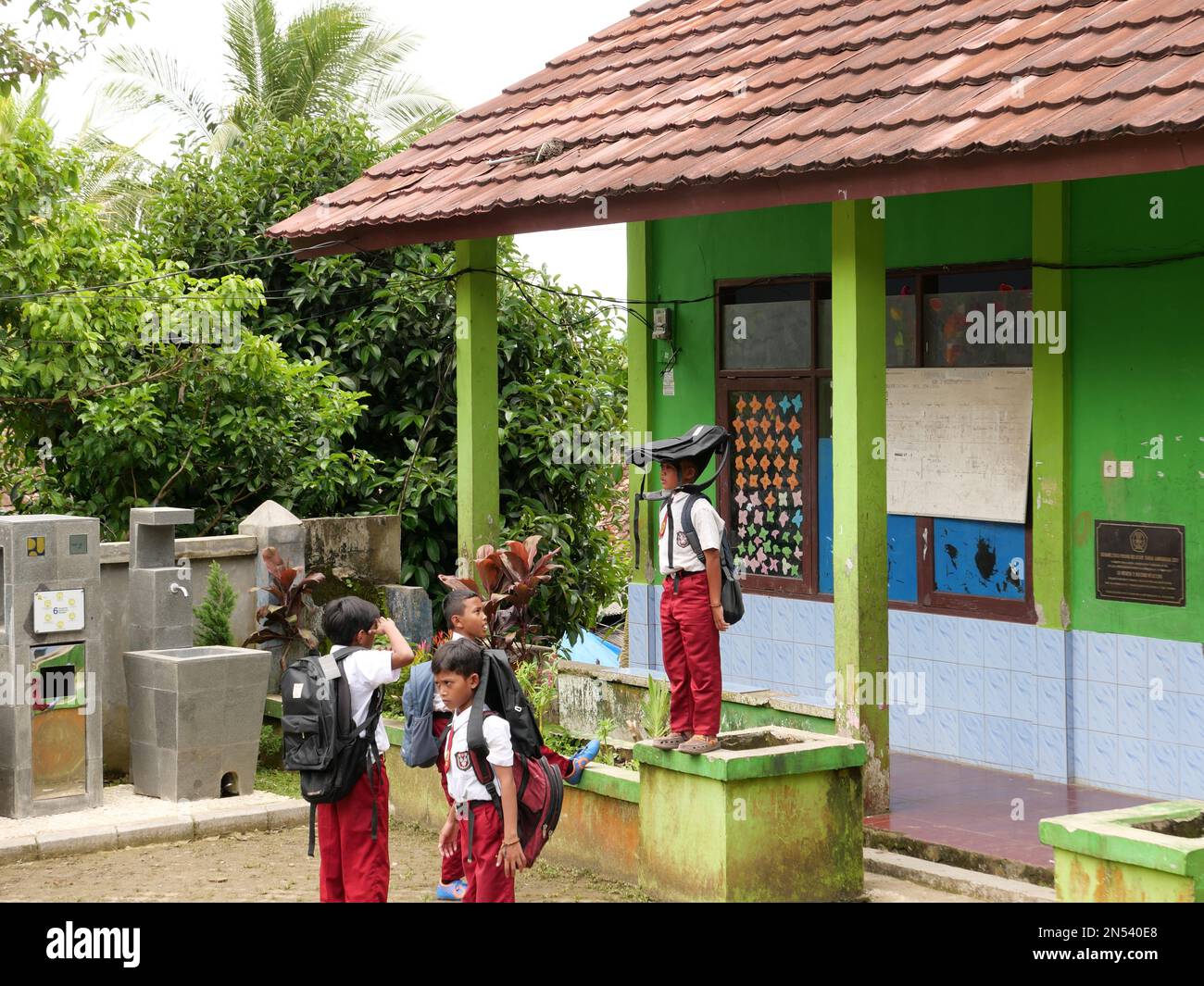 school children who are doing ceremonial exercises using school ...