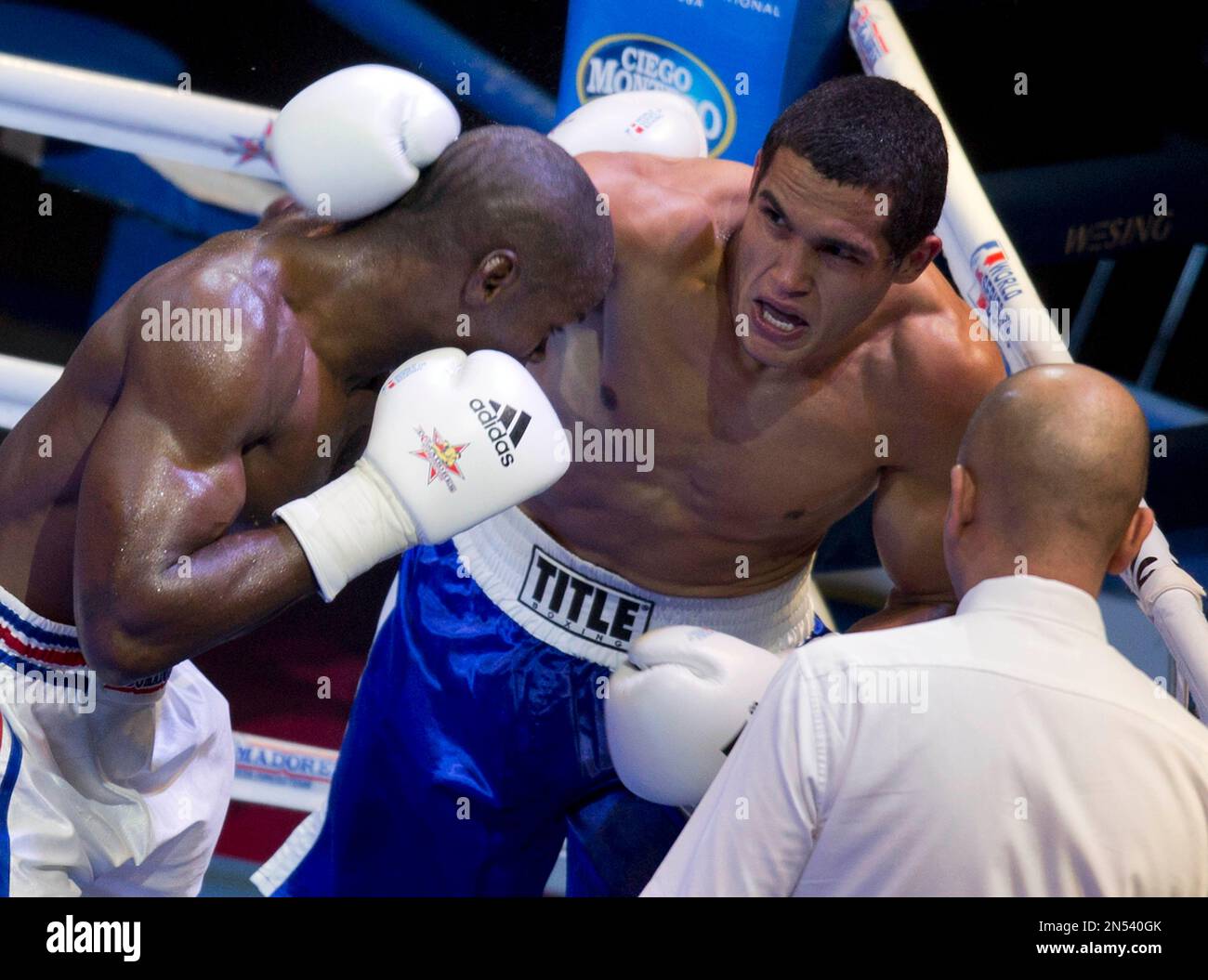 Cuban boxer Emilio Correa, left, fights with Michel Borges de Souz of ...