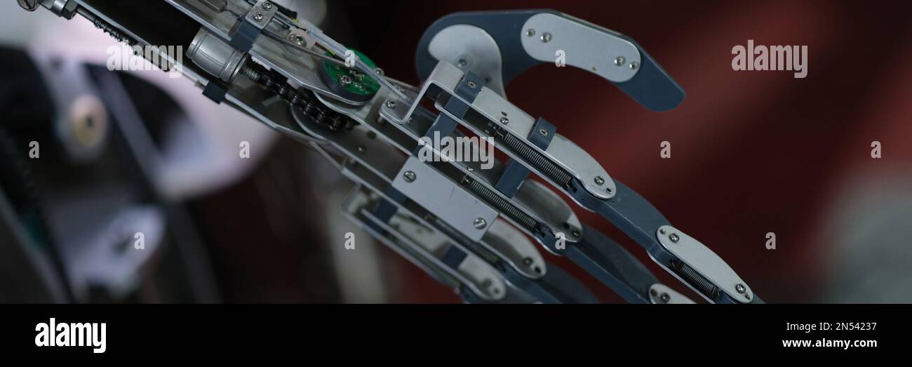 Future technologies in black prosthetic arm robot Stock Photo - Alamy