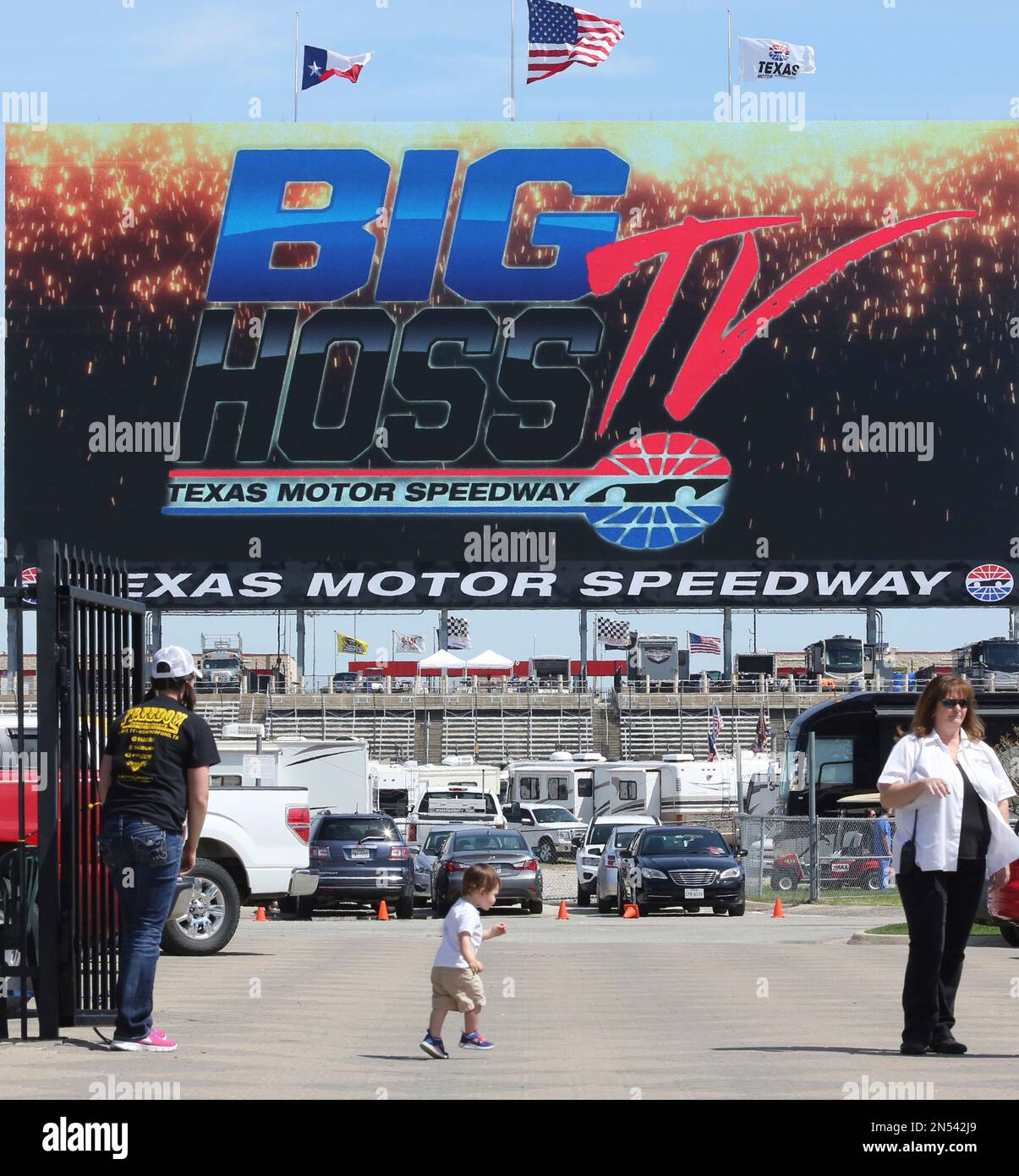 Eighteen-month-old Mason Webb, center, runs from his mother Kasey ...