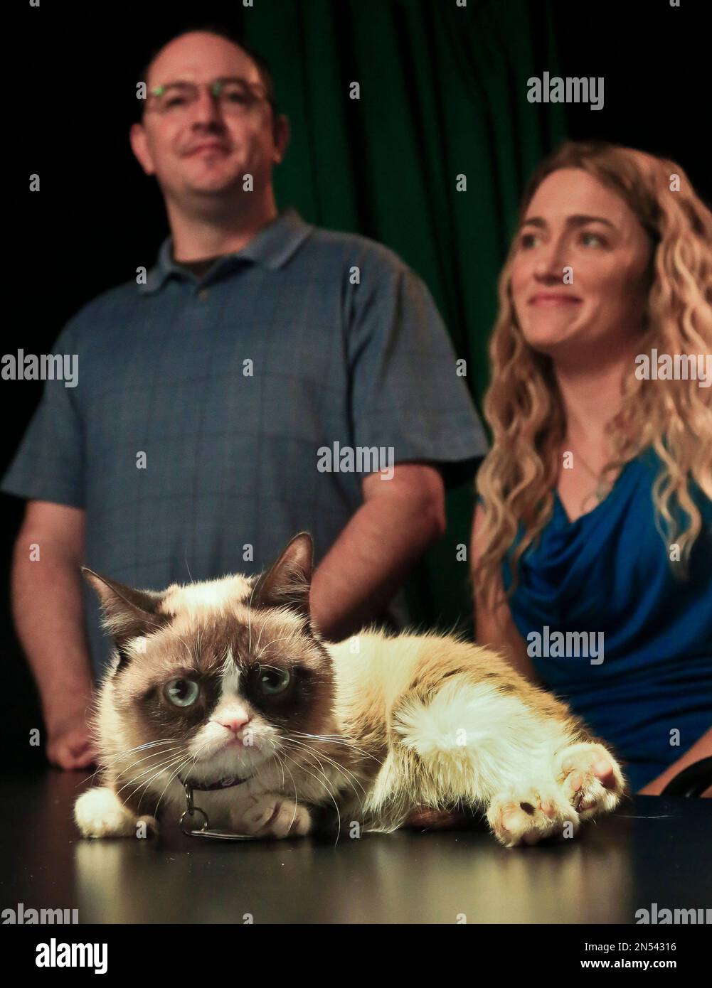 Bryan Bundesen, left and his sister Tabatha Bundesen pose with Grumpy Cat, whose real name is ...