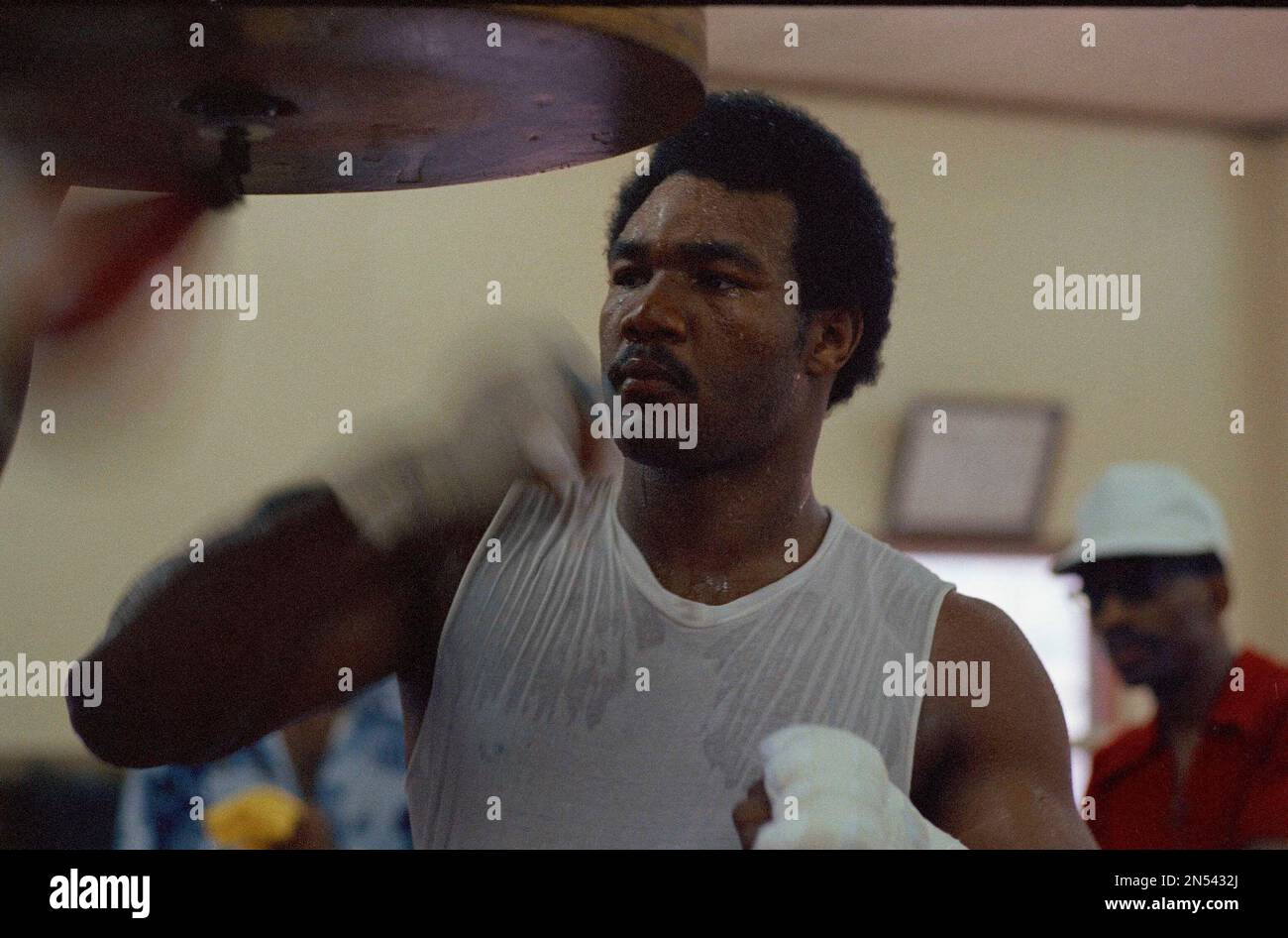 U.S. world heavyweight boxing champion George Foreman trains in Tokyo ...