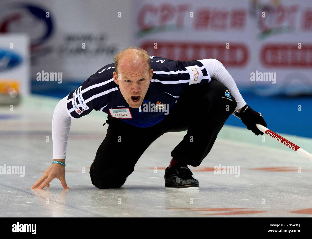 Scotland's Ewan MacDonald shouts after releasing the stone during their ...