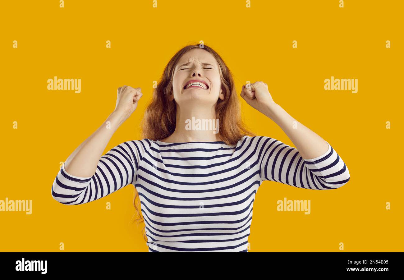 Desperate woman gets angry and cries out of despair, not knowing how to ...