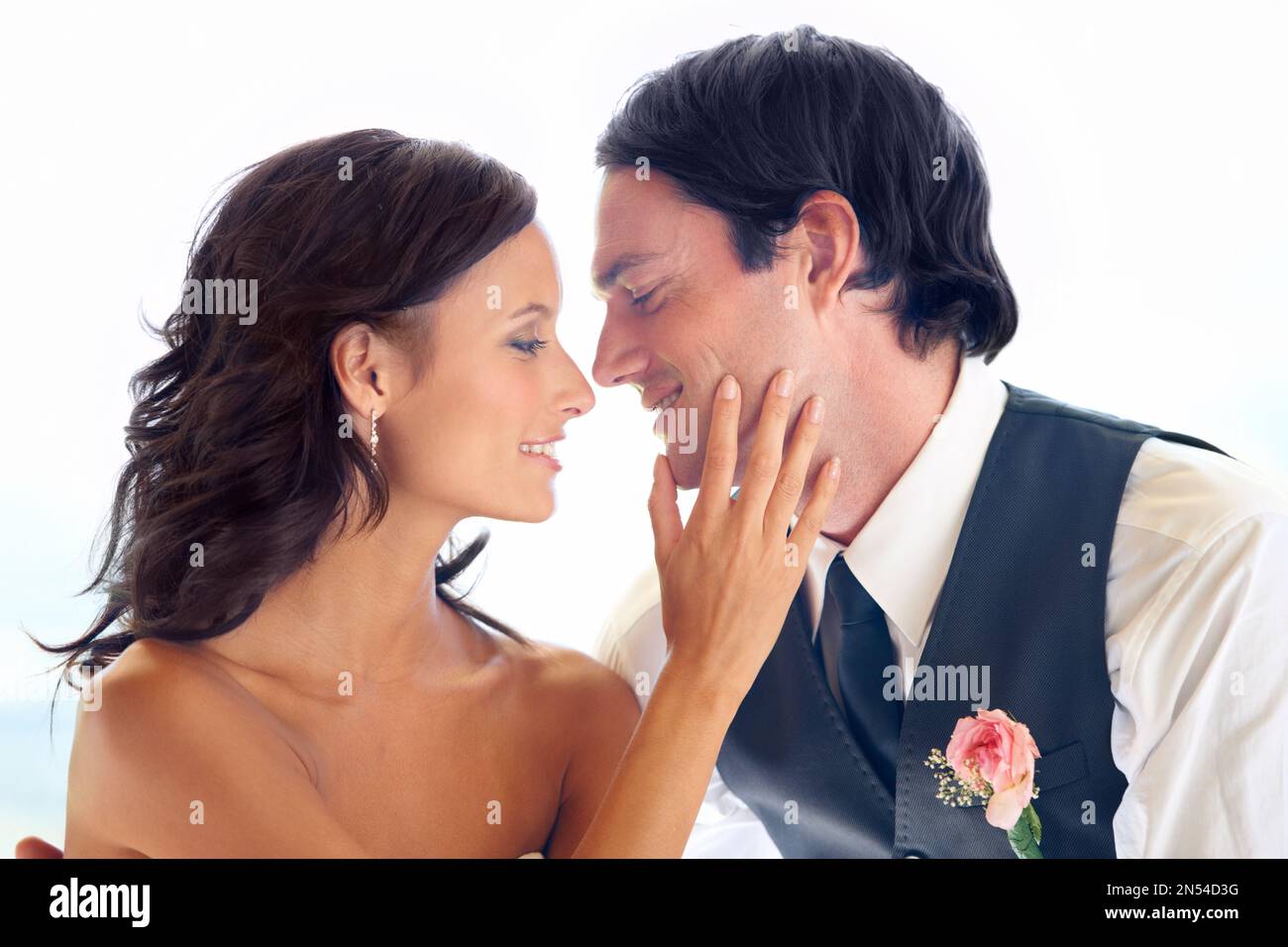 They share a bright future. A happy newlywed couple looking at each ...