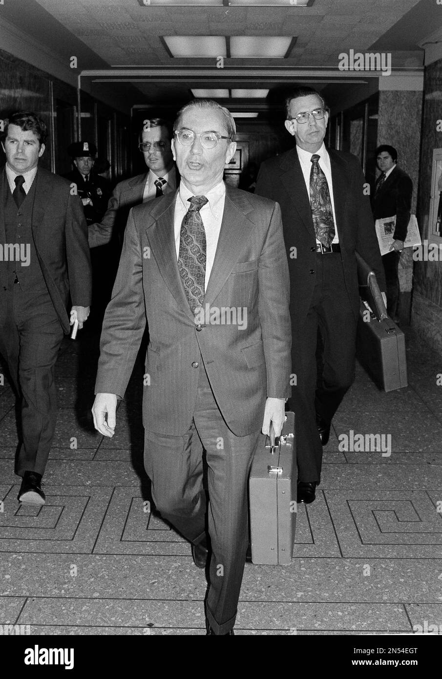 CIA Director William Colby, right, and Richard Helms, background, a ...